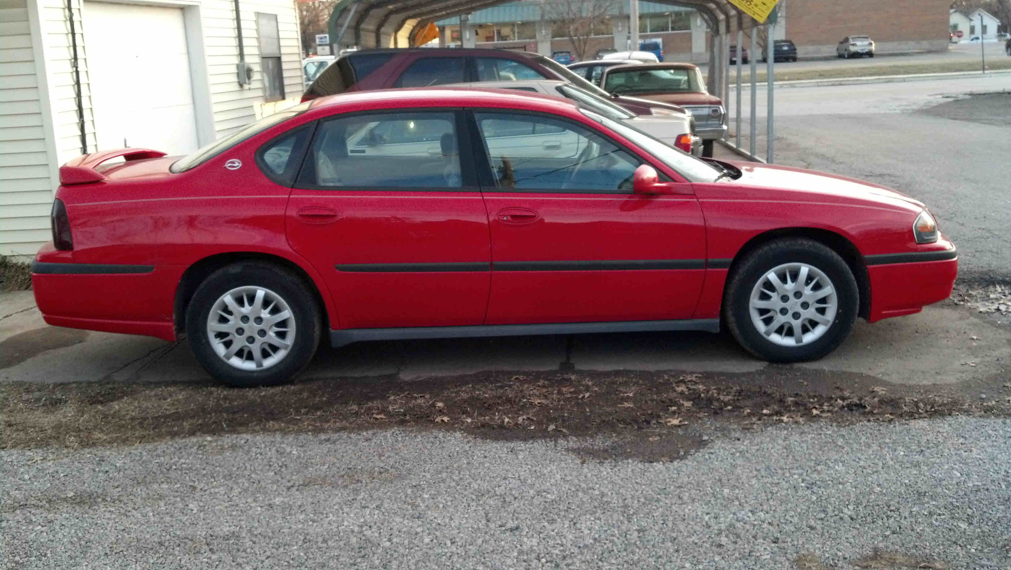 Red, grey cloth interior, V-6 3.4 liter, auto, front-wheel drive, 4 ...