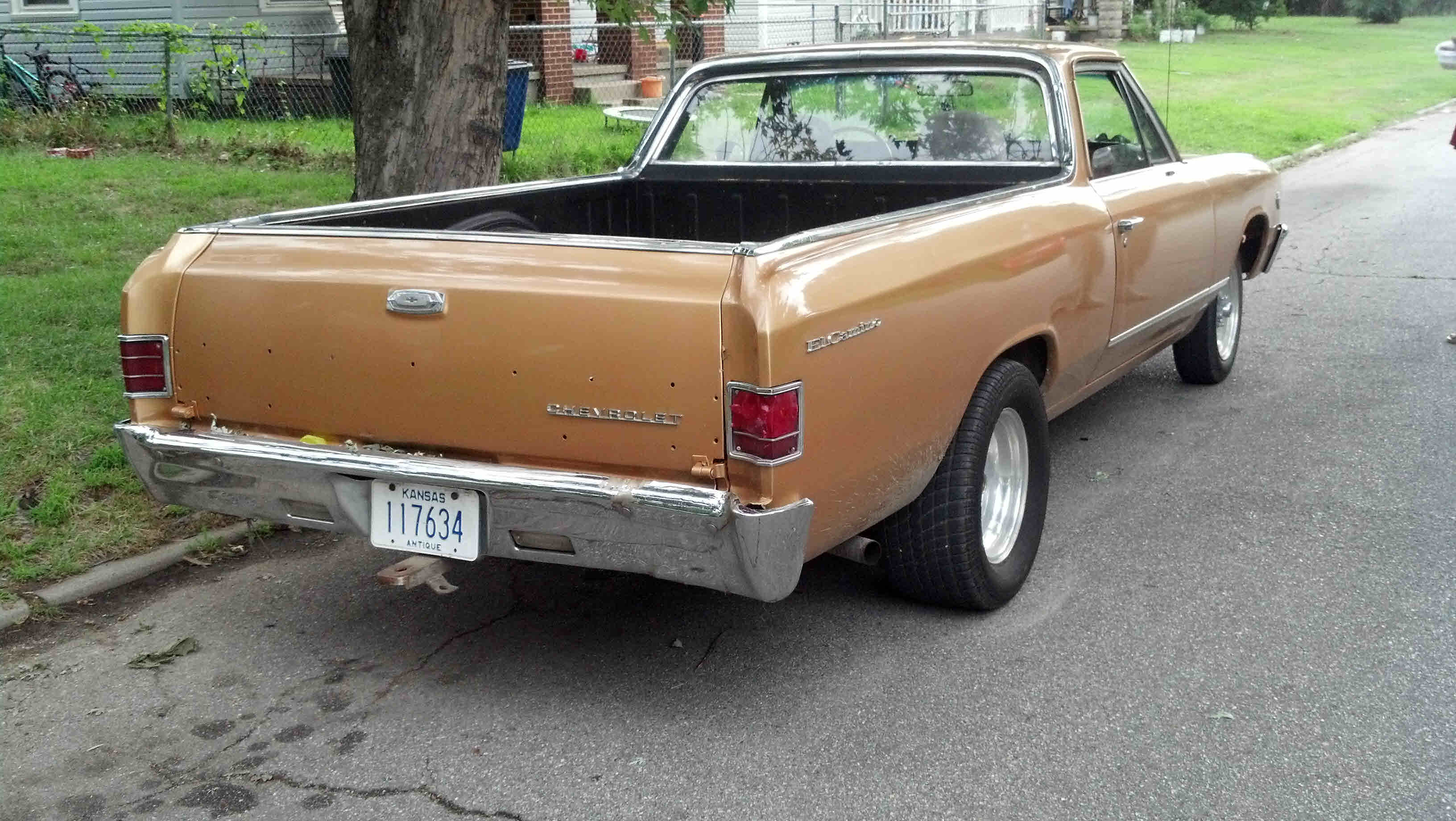 Gold w/black stripes, needs nicer seats, has nice headliner, newer ...