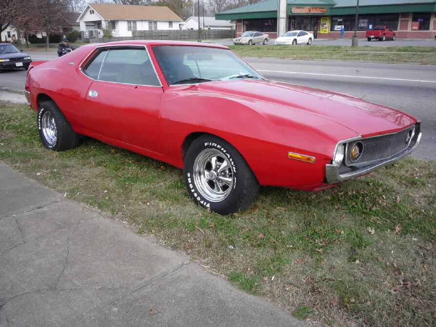 Red, black cloth & vinylinterior, V-8 360 (original), auto (reverse ...