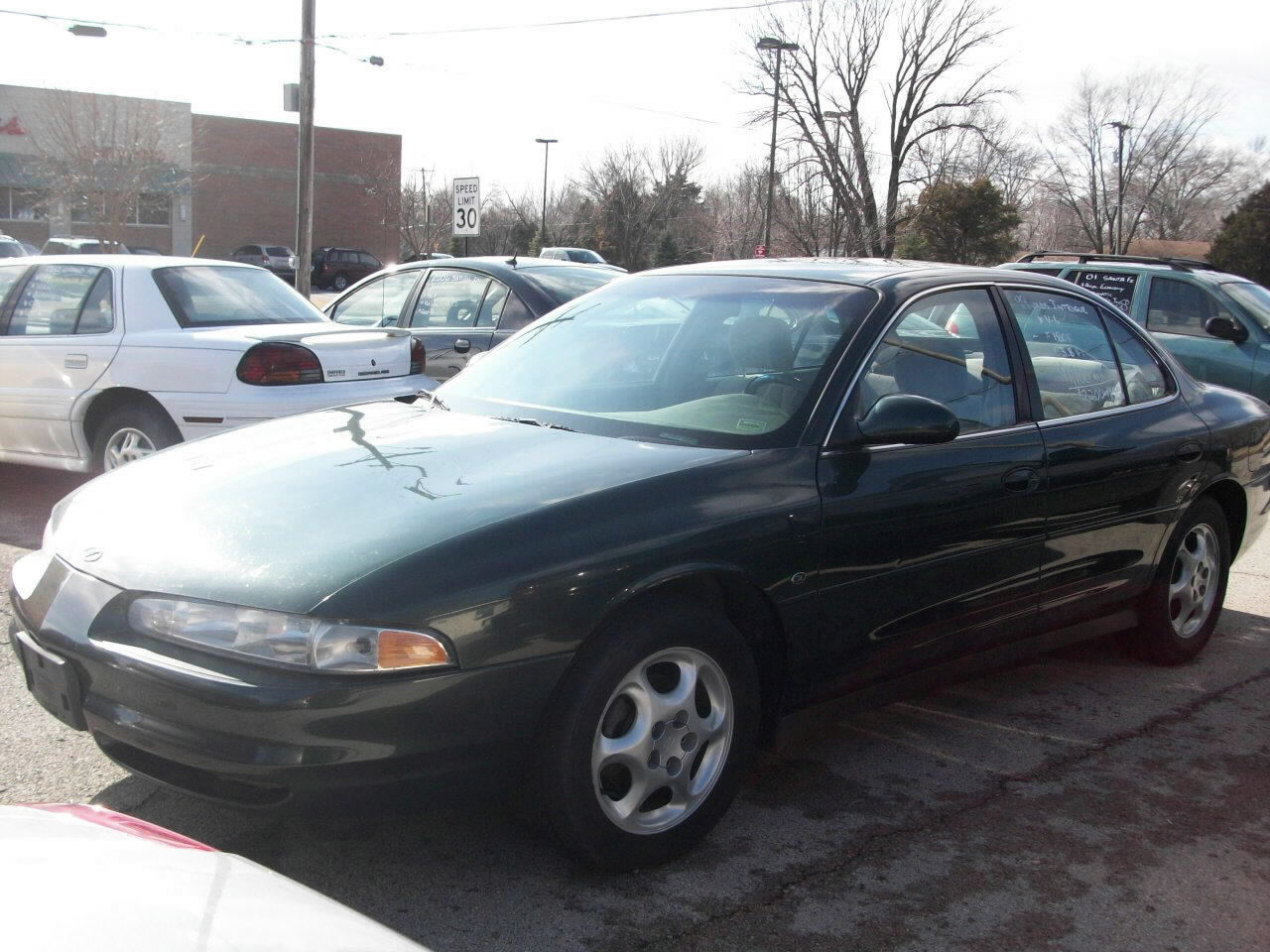 Dark green, 181,554 miles, local car
