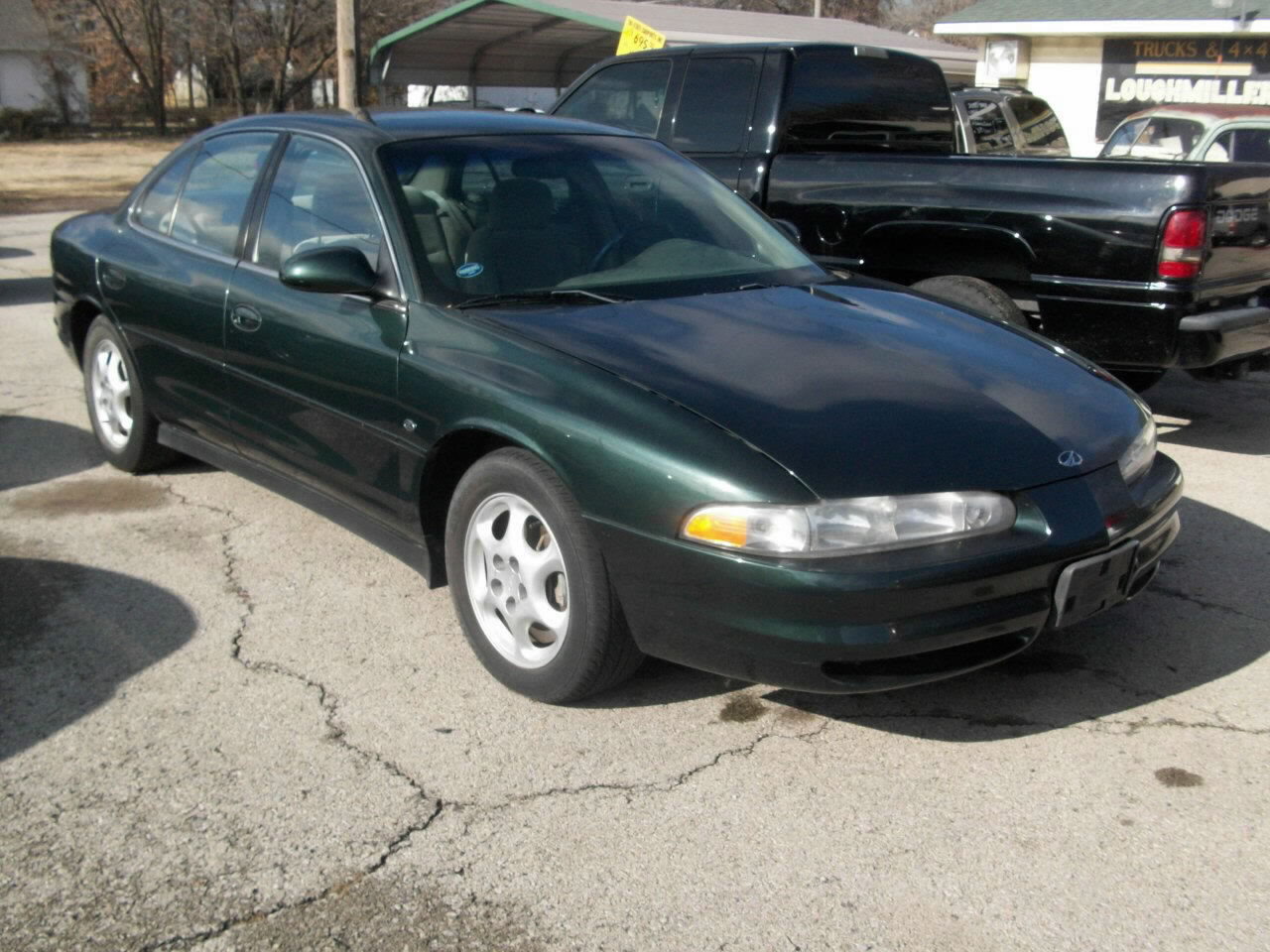 Dark green, 181,554 miles, local car